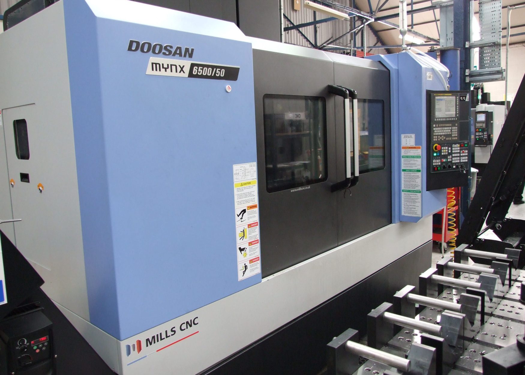 DN Solutions Vertical Machining Centres - Mills CNC